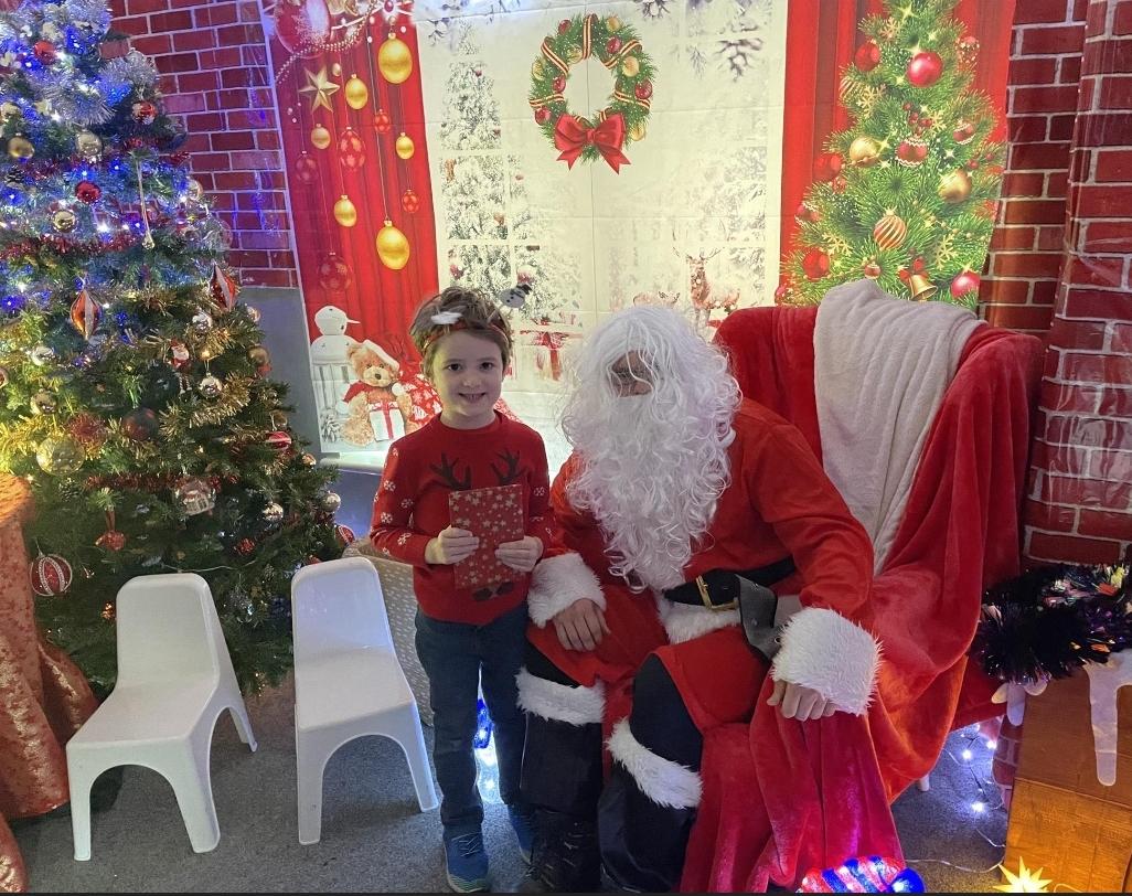 Community Hub organisers spread Christmas joy with grotto for 600 ...